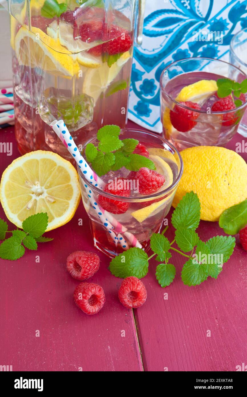 Homemade lemonade with raspberries Stock Photo - Alamy