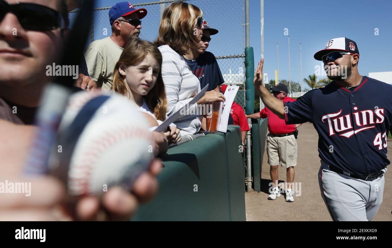 Minnesota Twins catcher Josmil Pinto waves to fans after signing ...