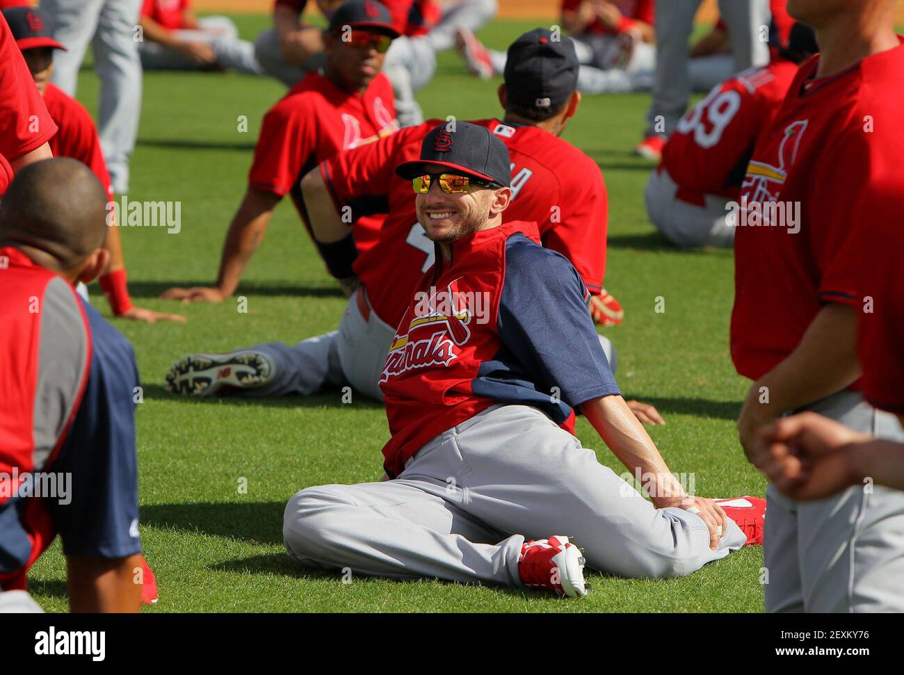 St. Louis Cardinals outfielder Shane Robinson stretches during warm-ups ...