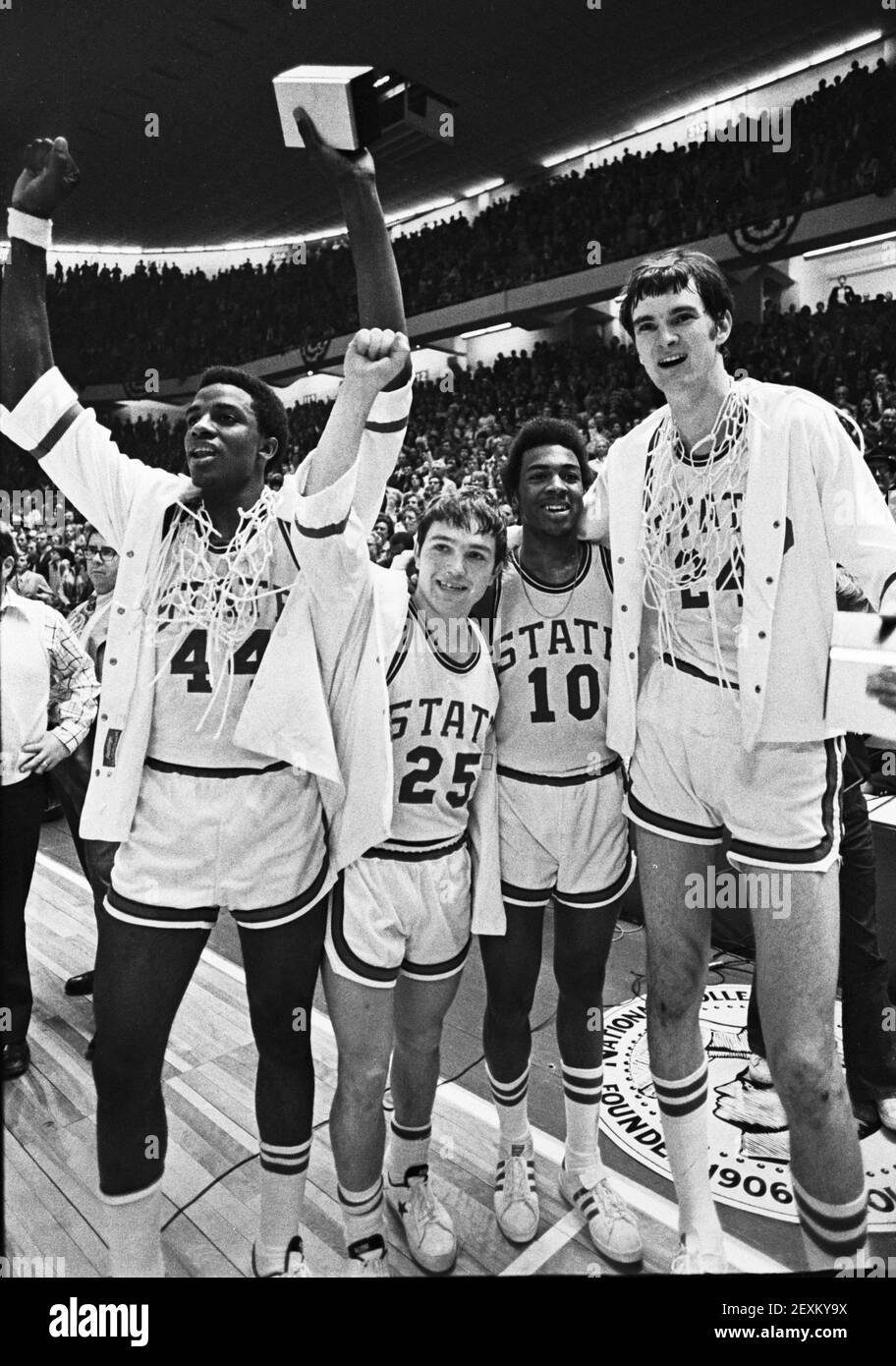 In this 1974 file photograph, NC State's David Thompson, Monte Towe, Mo ...