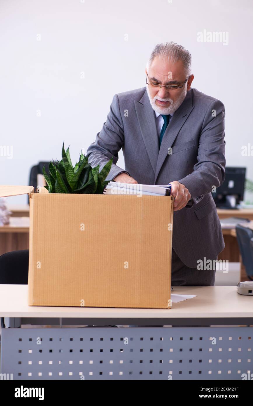 Old employee being fired from his work Stock Photo - Alamy