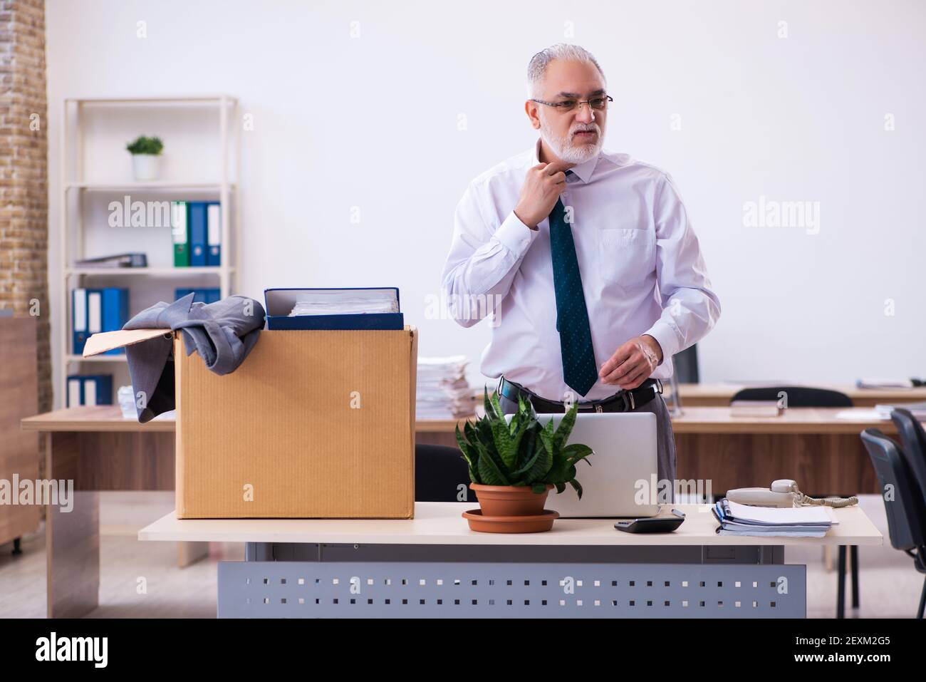 Old employee being fired from his work Stock Photo - Alamy