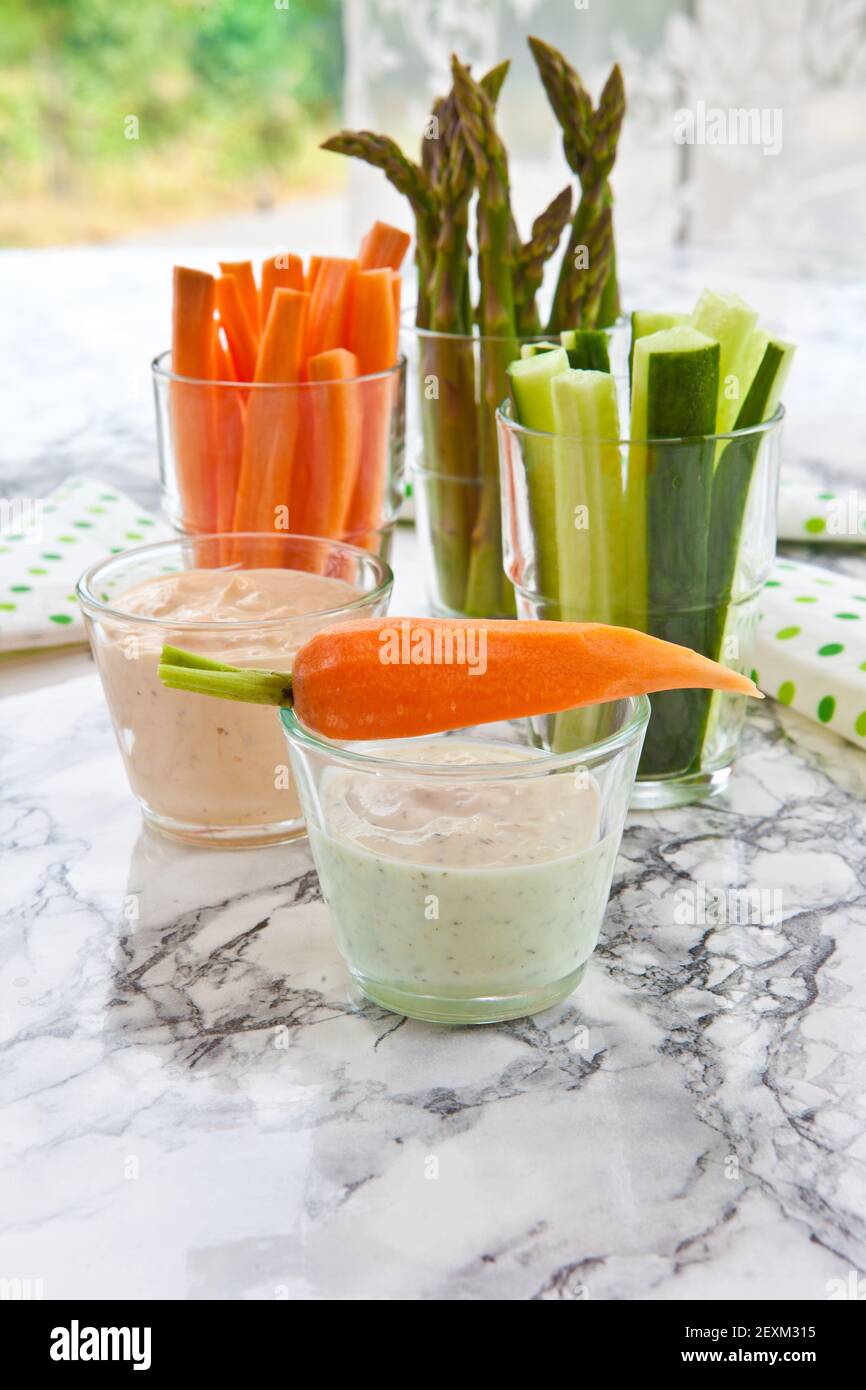 Colourful vegetable sticks with curd cheese Stock Photo - Alamy