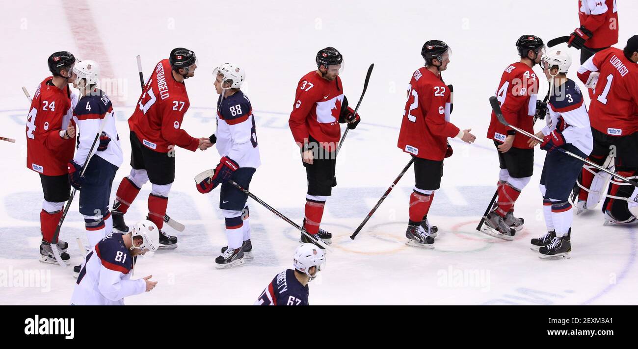 USA and Canada shake hands after a men's hockey semifinal at Bolshoy ...