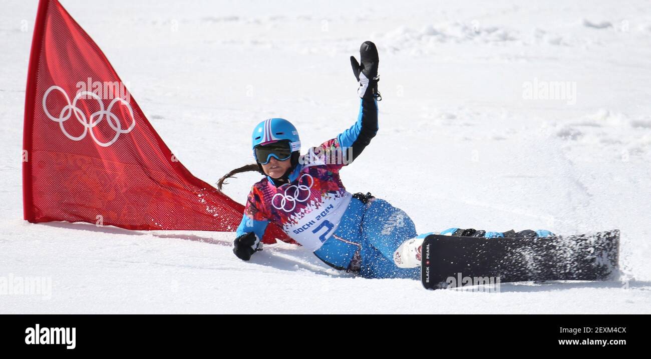 Claudia Riegler of Austria falls during snowboard parallel slalom at ...