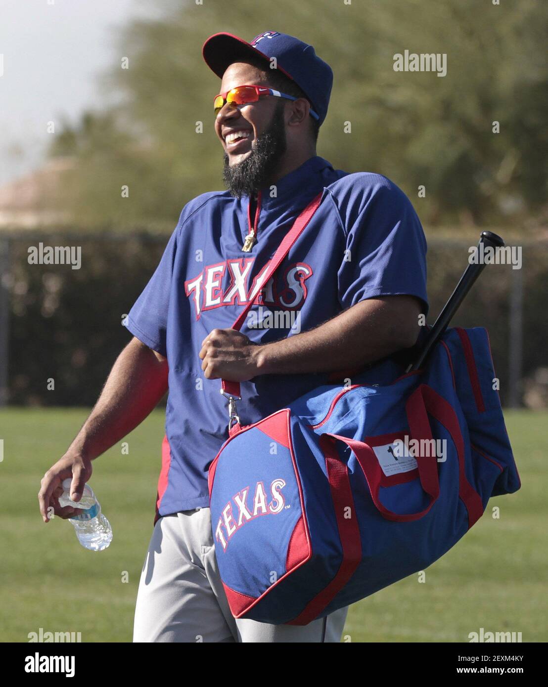 Texas Rangers infielder Elvis Andrus shows up for practice with a smile ...