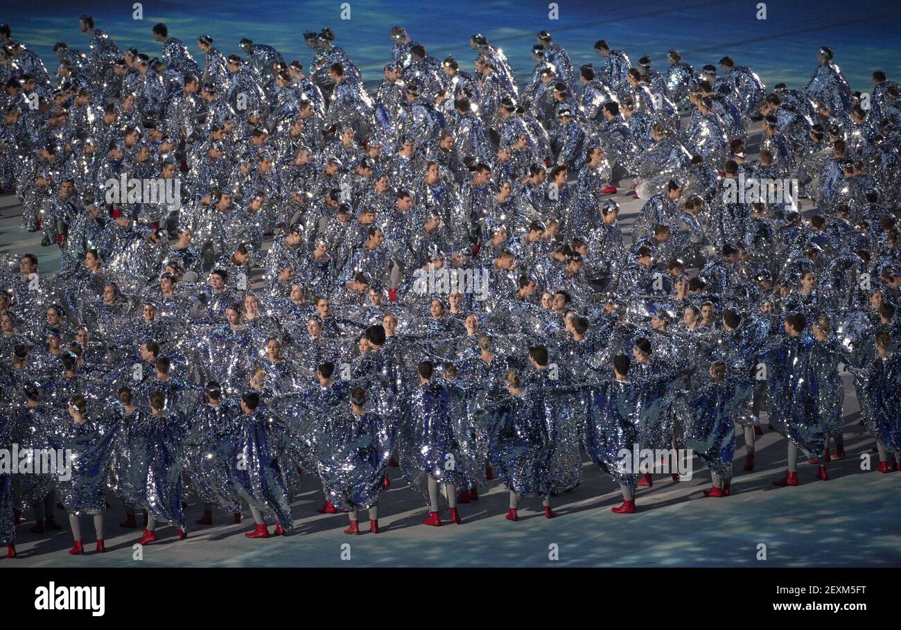 Performers in mirrored costumes flow through Fisht Stadium during the ...