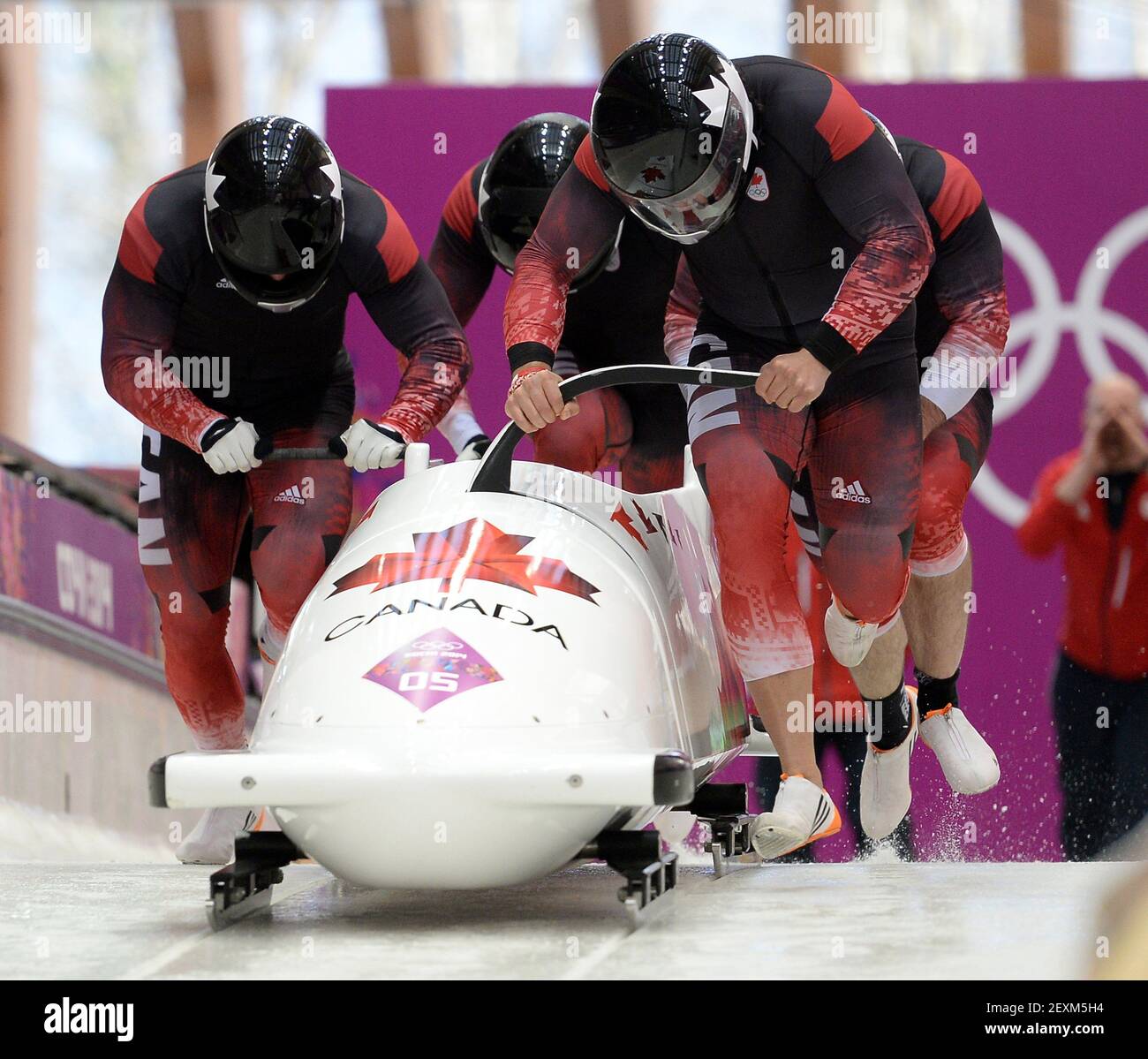 The Canada 1 bobsled starts its fourth-heat run in the four-man bobsled ...