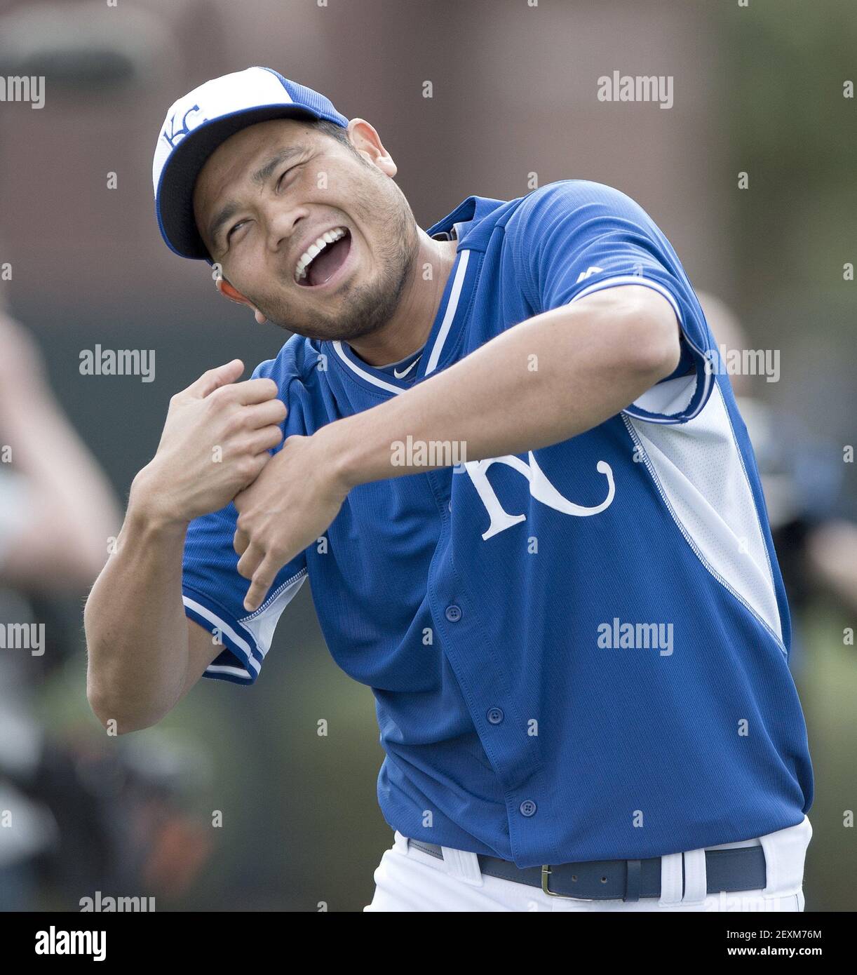Kansas City Royals pitcher Bruce Chen jokes with teammates during a ...
