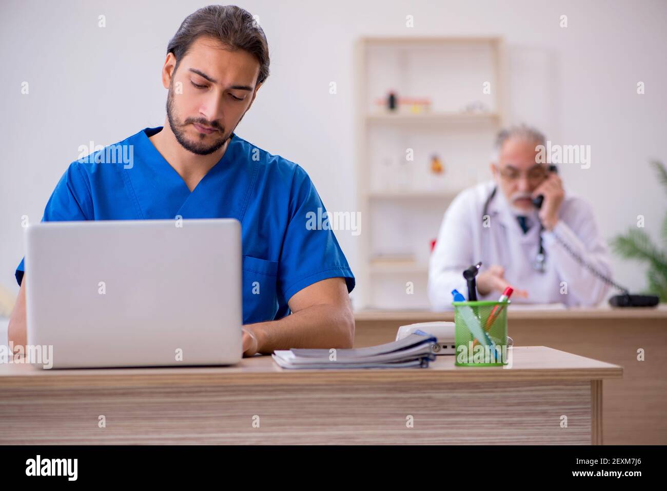 Two doctors working in the hospital Stock Photo - Alamy