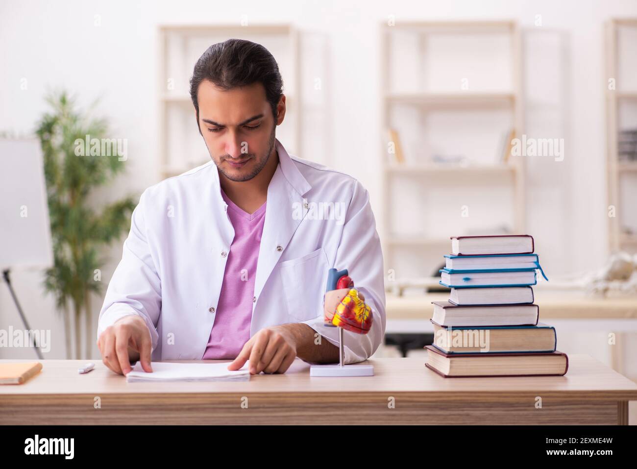 Young doctor student cardiologist sitting in the classroom Stock Photo ...
