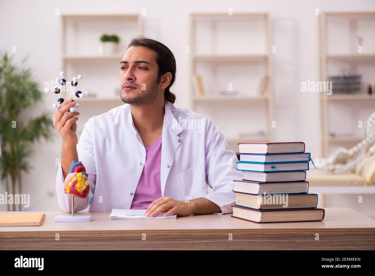 Young doctor student sitting in the classroom Stock Photo - Alamy