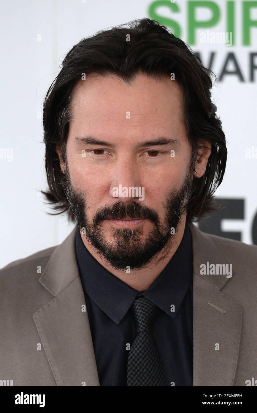 Actor Keanu Reeves arrives at the 2014 Film Independent Spirit Awards ...