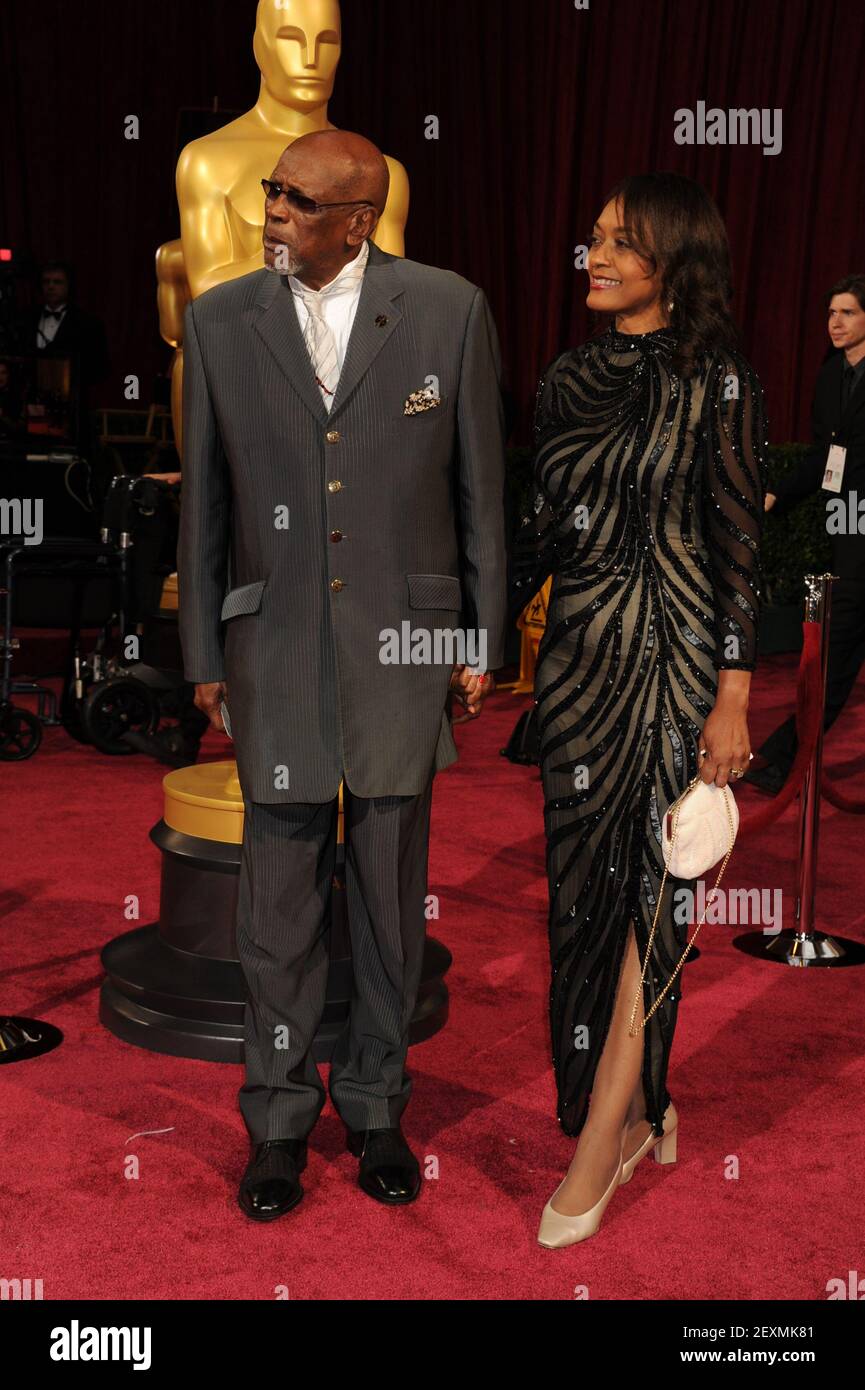Louis Gossett Jr and guest arrive at the 86th Annual Academy Awards at ...