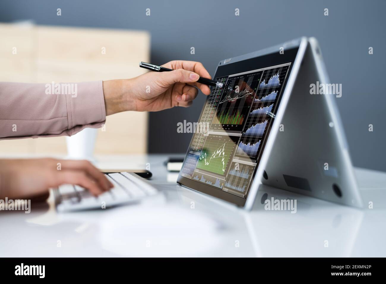 Stock Exchange Broker Software Graph On Laptop Stock Photo - Alamy
