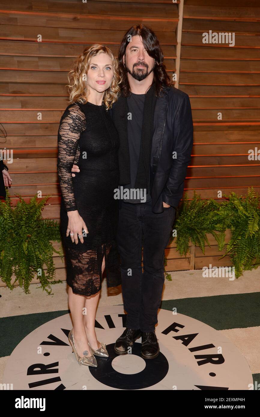 Jordyn Blum and David Grohl arrive at the 2014 Vanity Fair Oscar Party ...