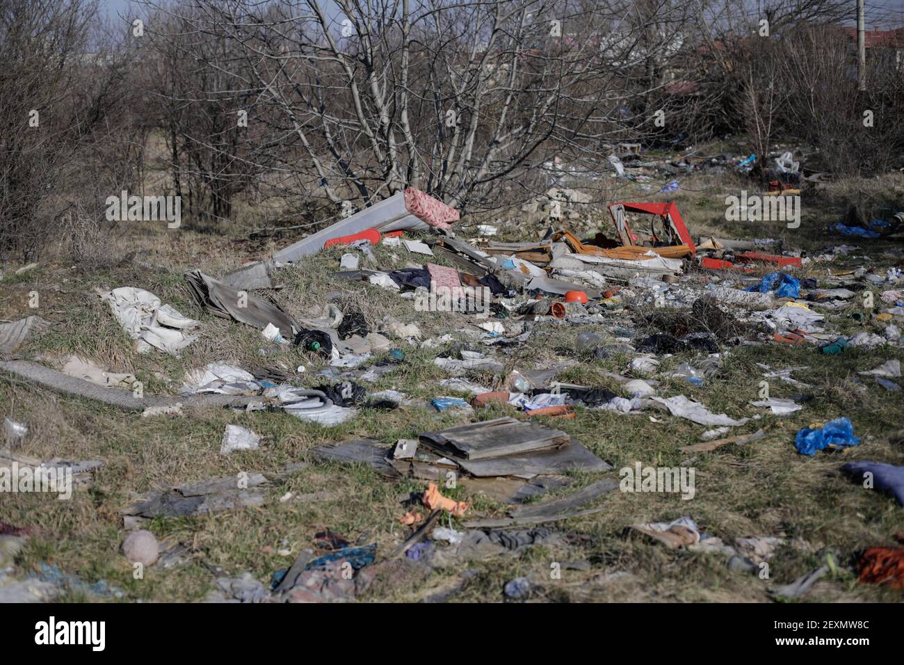 Shallow depth of field details of garbage and construction debris ...