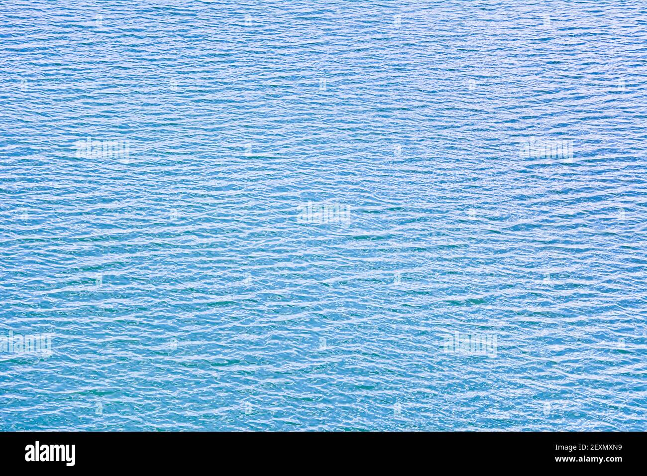 Clear water surface with waves Stock Photo - Alamy