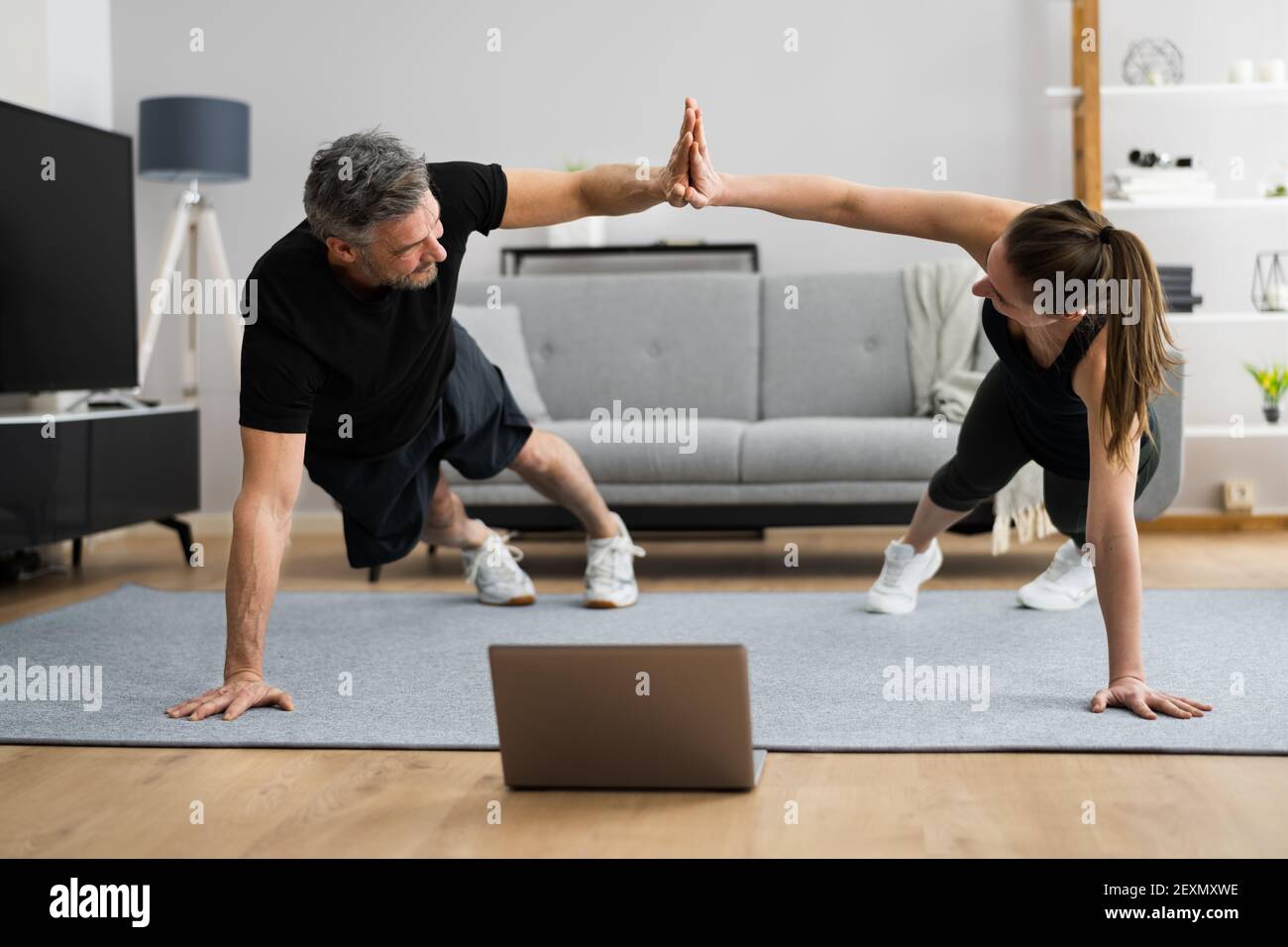 Online Family Gym Class Workout And Fitness Exercise Stock Photo - Alamy