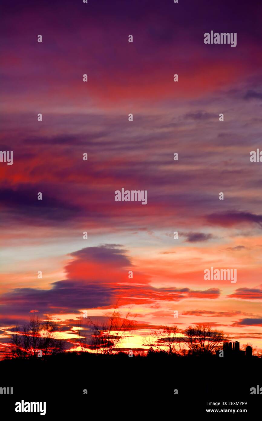 Beautiful multi-colored clouds before sunrise Stock Photo - Alamy