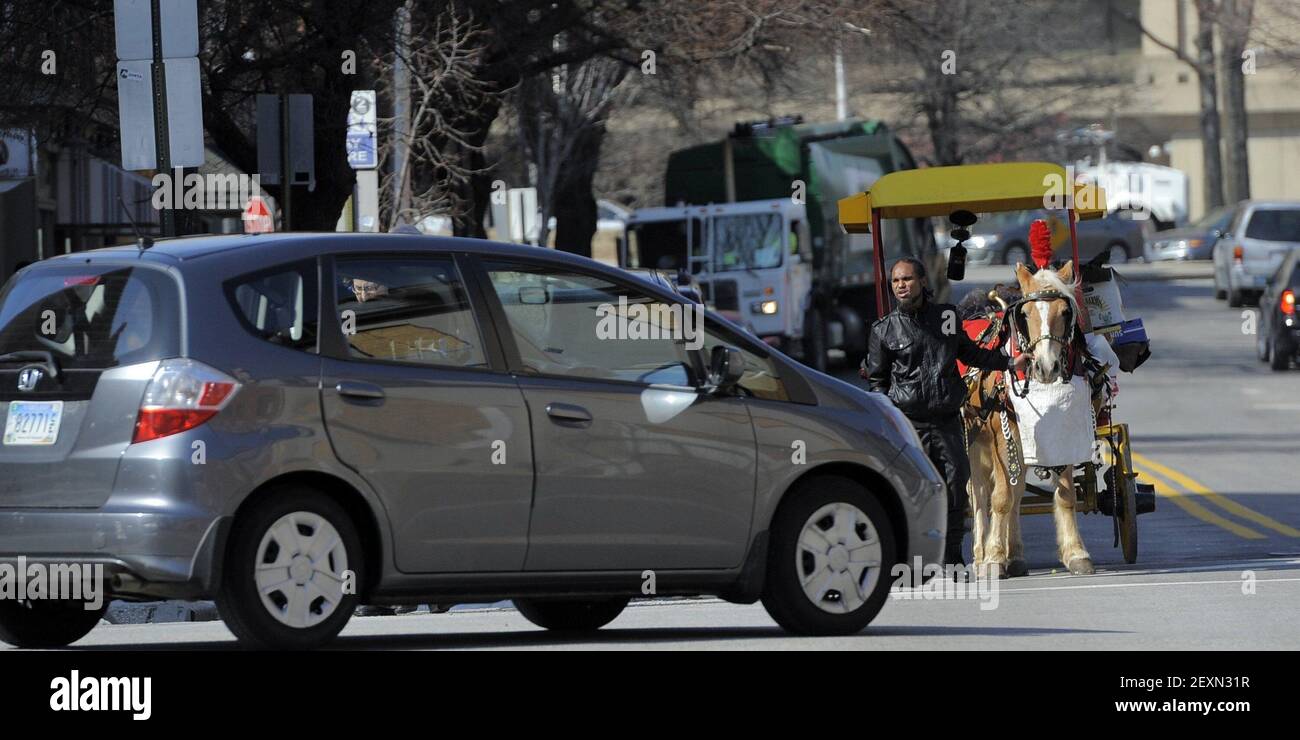 Arabber Bilal Yusef Abdullah and his horse, Tony, walk on Read Street ...