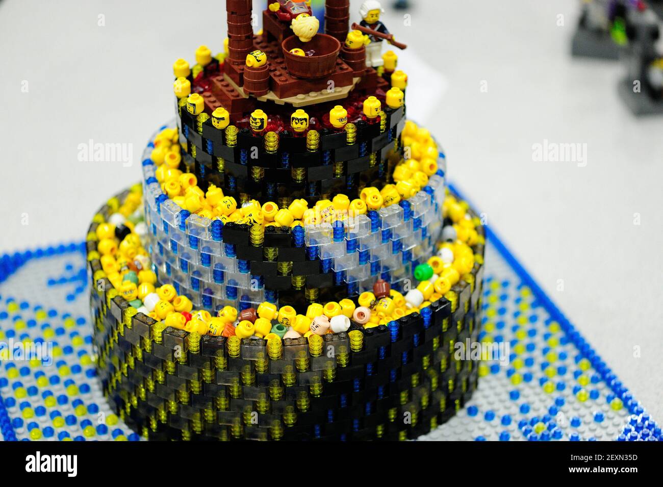 A cake made out of Lego pieces on display at the Bricks Cascade ...