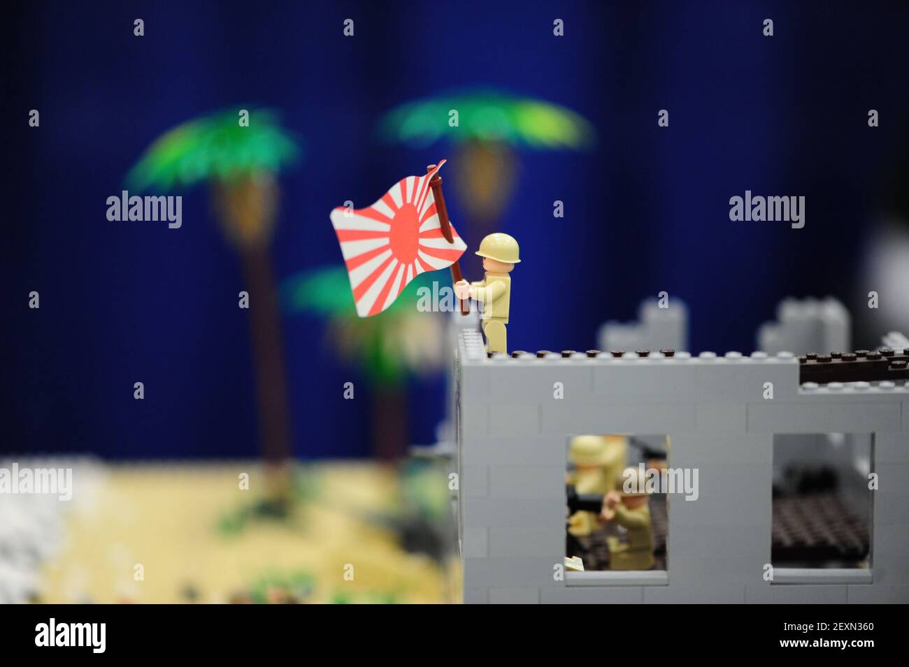 A Japanese Lego figure holds his flag high as part of a model ...