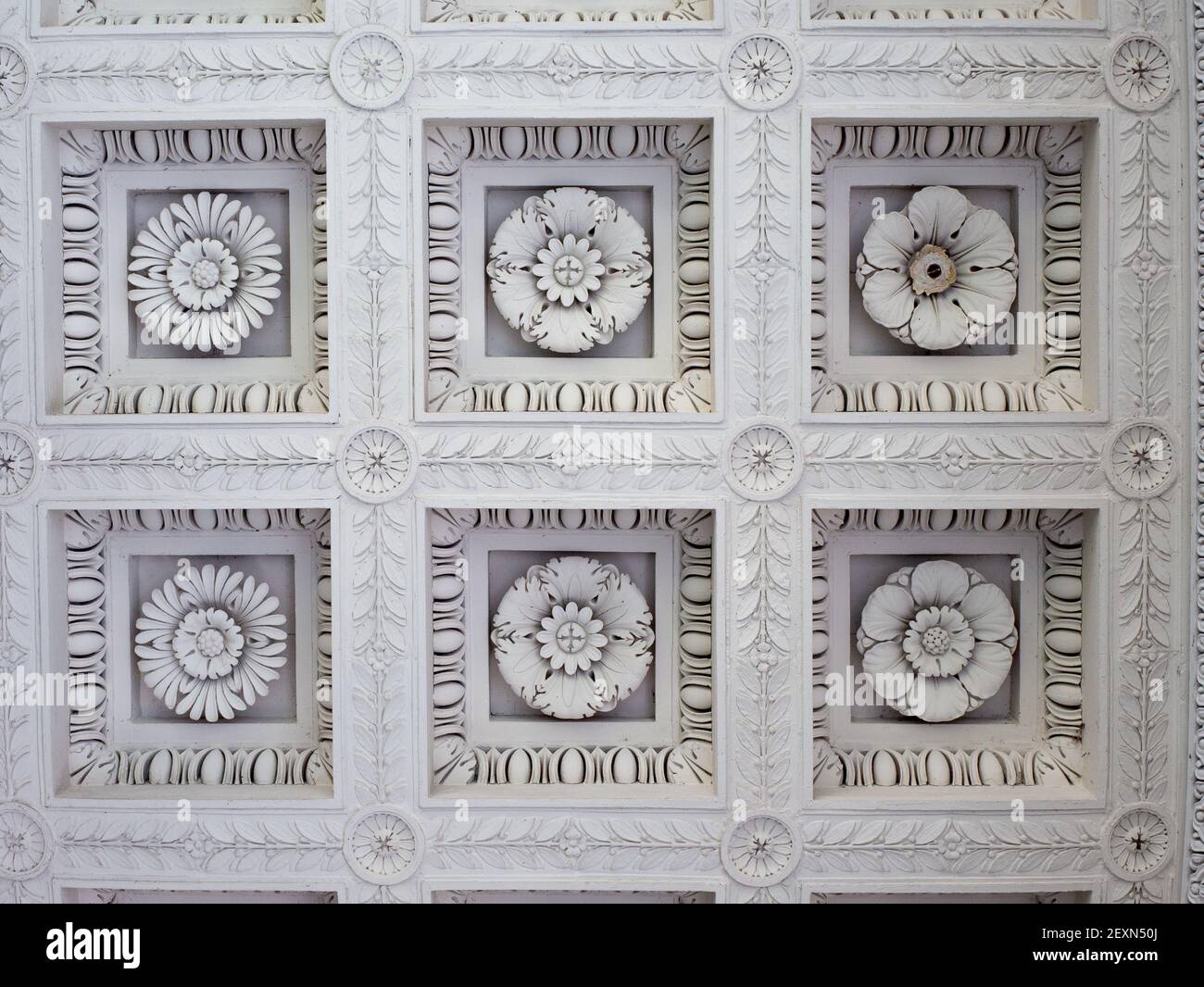 coffered ceiling made of stucco squared tessels with floral decorations ...