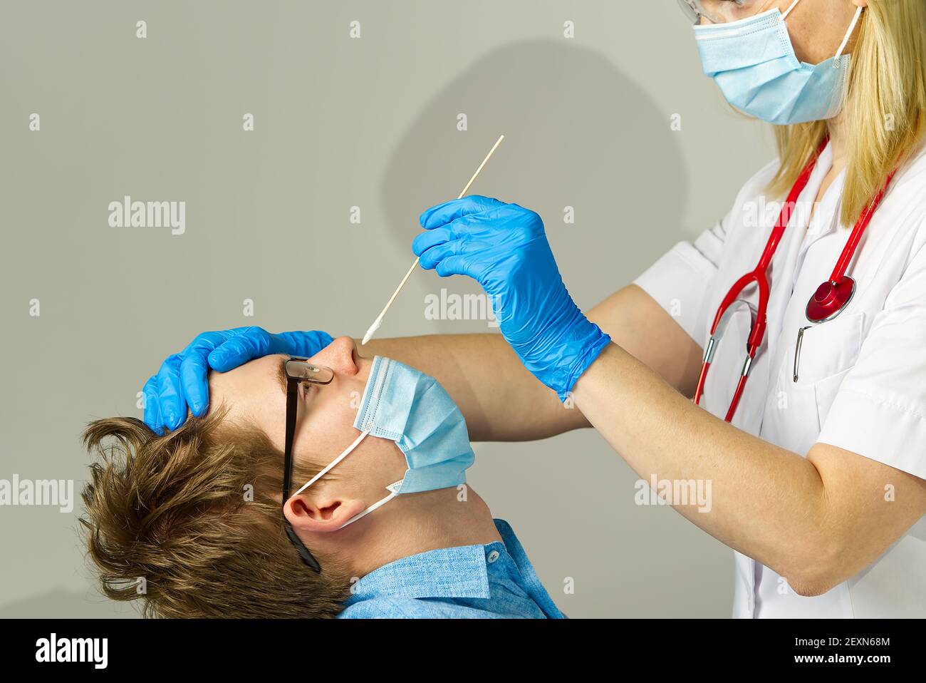 Pediatrician or doctor taking nasal mucus test, covid - 19 test . covid ...