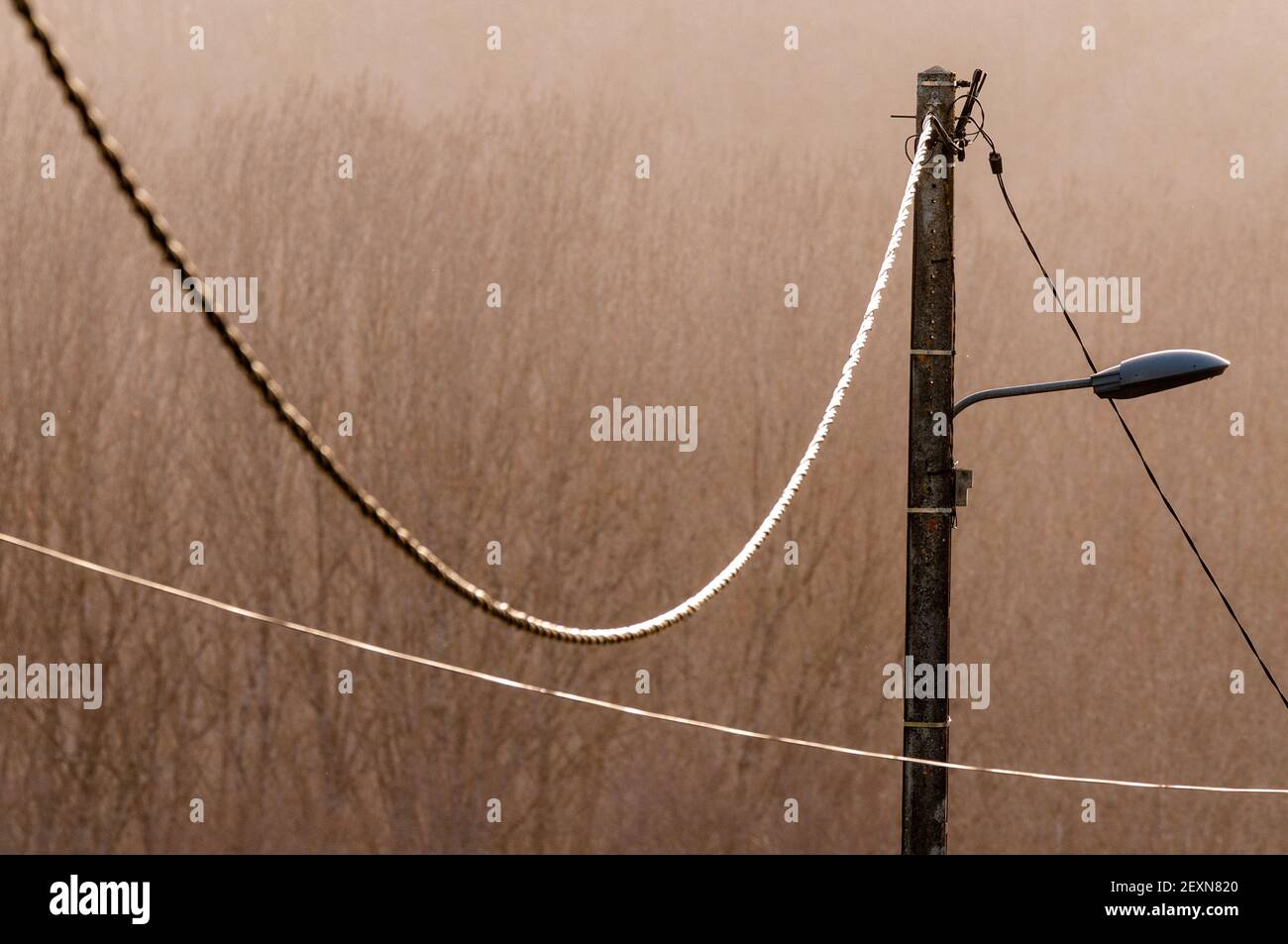 Hanging electrical cables hi-res stock photography and images - Alamy