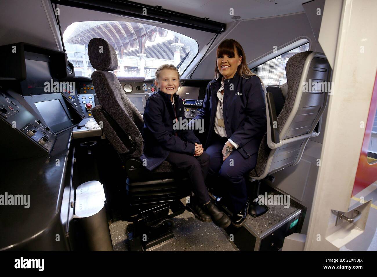 EDITORIAL USE ONLY (left to right) Maisie, aged 8 and her mum Becky ...