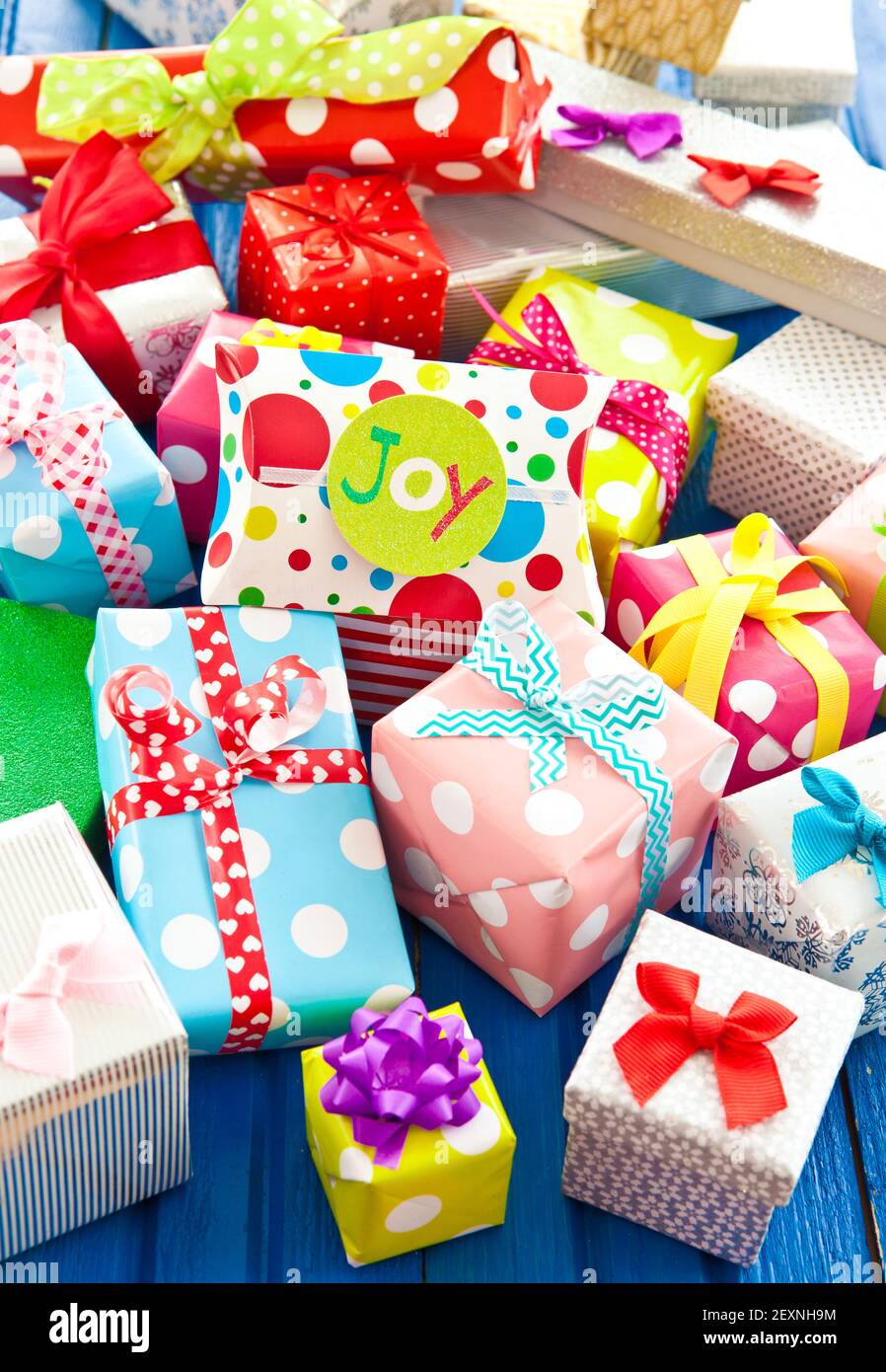 Colorful gifts on blue Stock Photo - Alamy