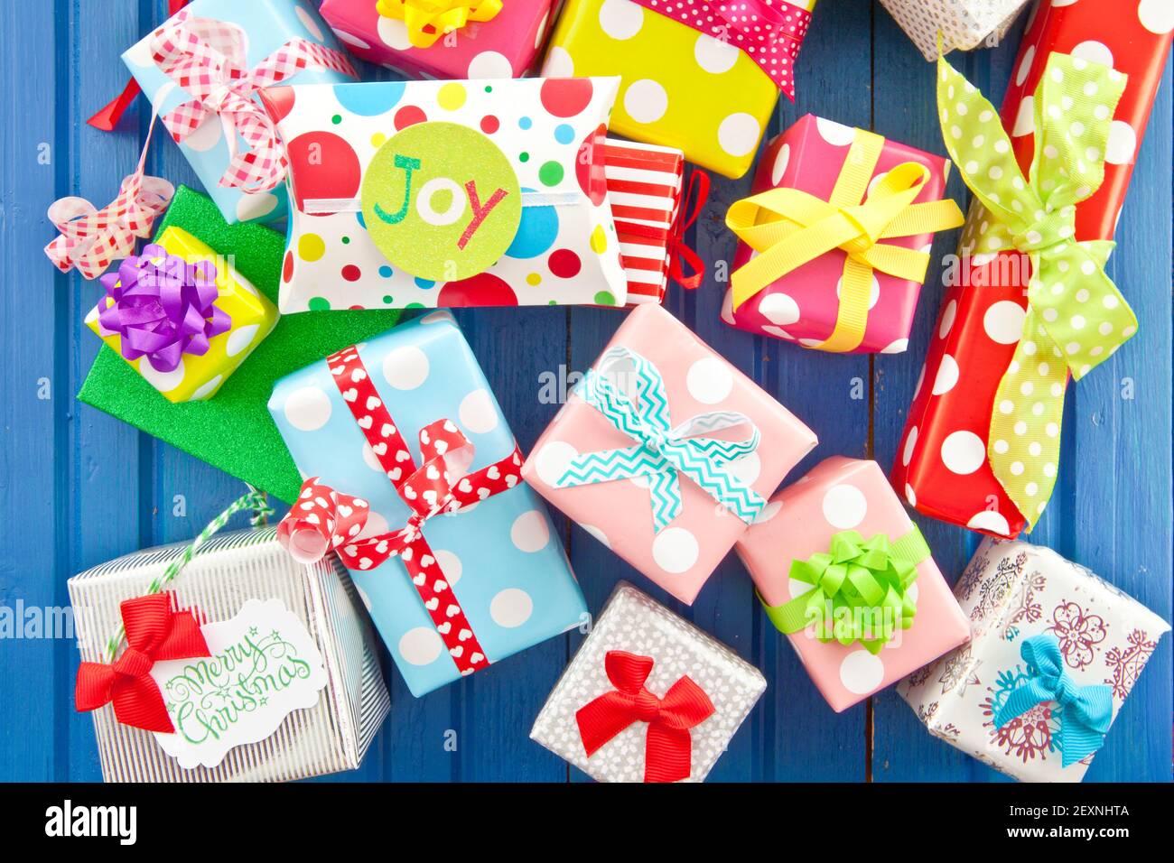 Colorful gifts on blue Stock Photo - Alamy