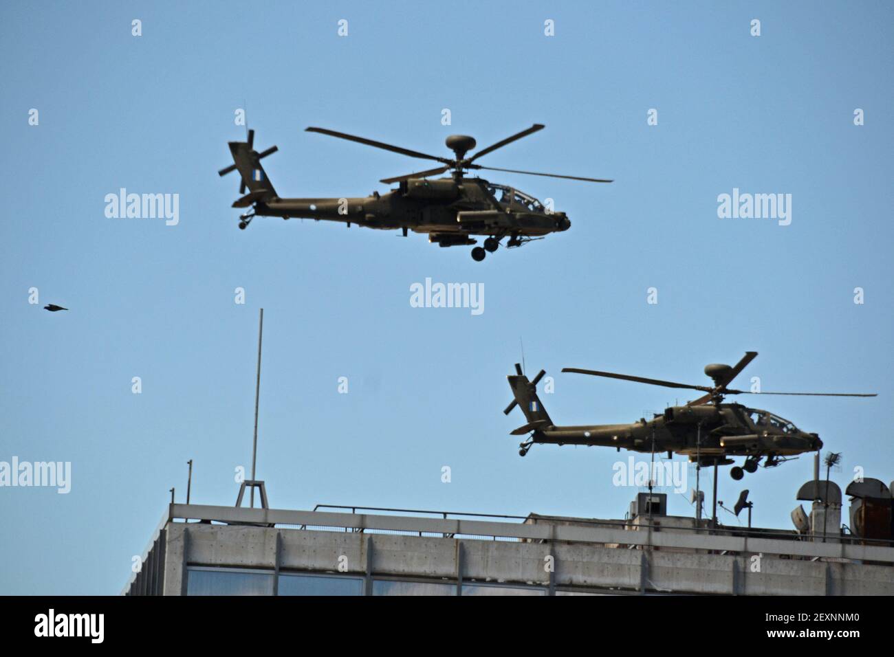 Athens,Greece March 25th- A pair of AH64d Longbow Attack Hellicopters ...