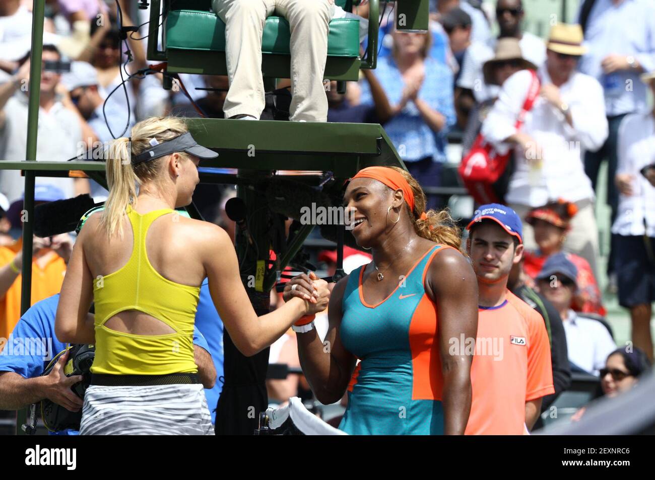 Serena Williams (USA) shakes hands with Maria Sharapova after defeating her during the 2014 SONY ...