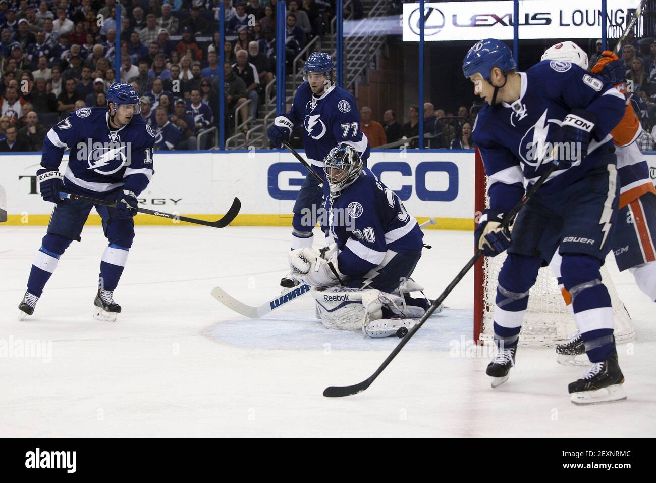 Tampa Bay Lightning goalie Ben Bishop (30) can't stop a shot by the New York Islanders' Matt ...
