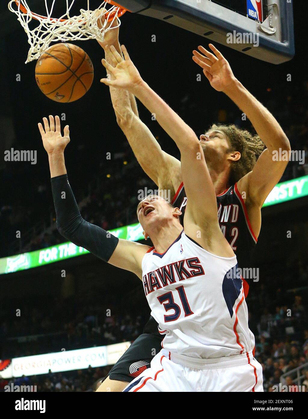 The Portland Trail Blazers' Robin Lopez dunks over the Atlanta Hawks ...