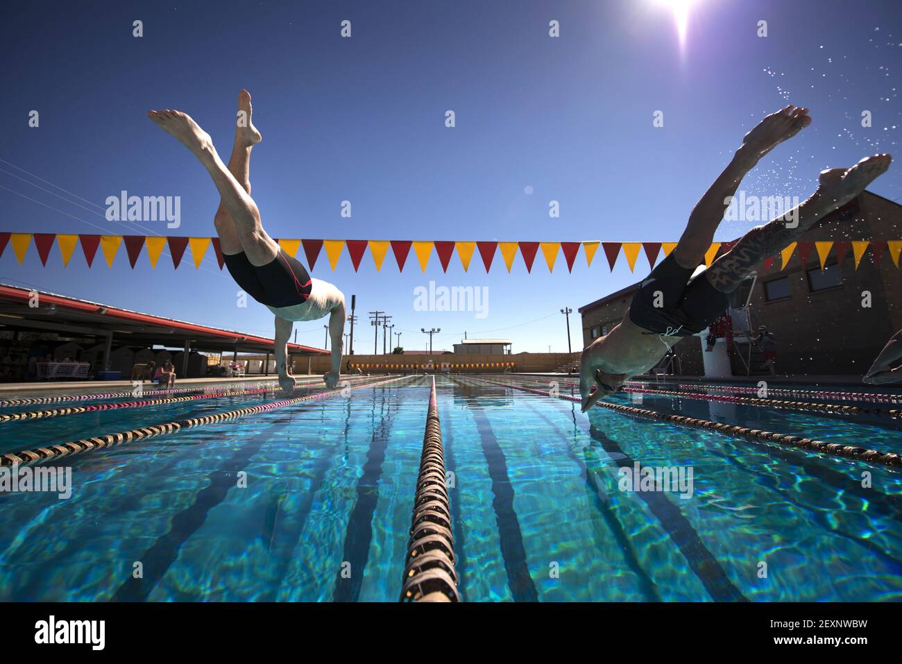 Marine veteran Cpl Kyle Reid, from Chinook, Mont., dives into the pool ...
