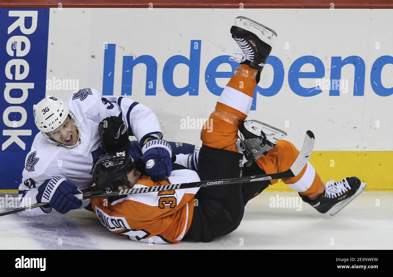 The Philadelphia Flyers' Zac Rinaldo collides with the Toronto Maple ...