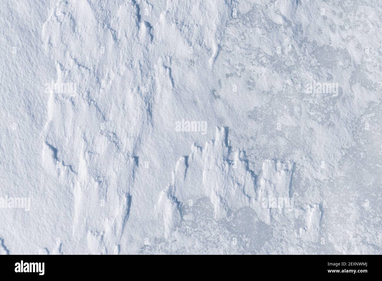 Ice texture closeup background brightly lit Stock Photo - Alamy