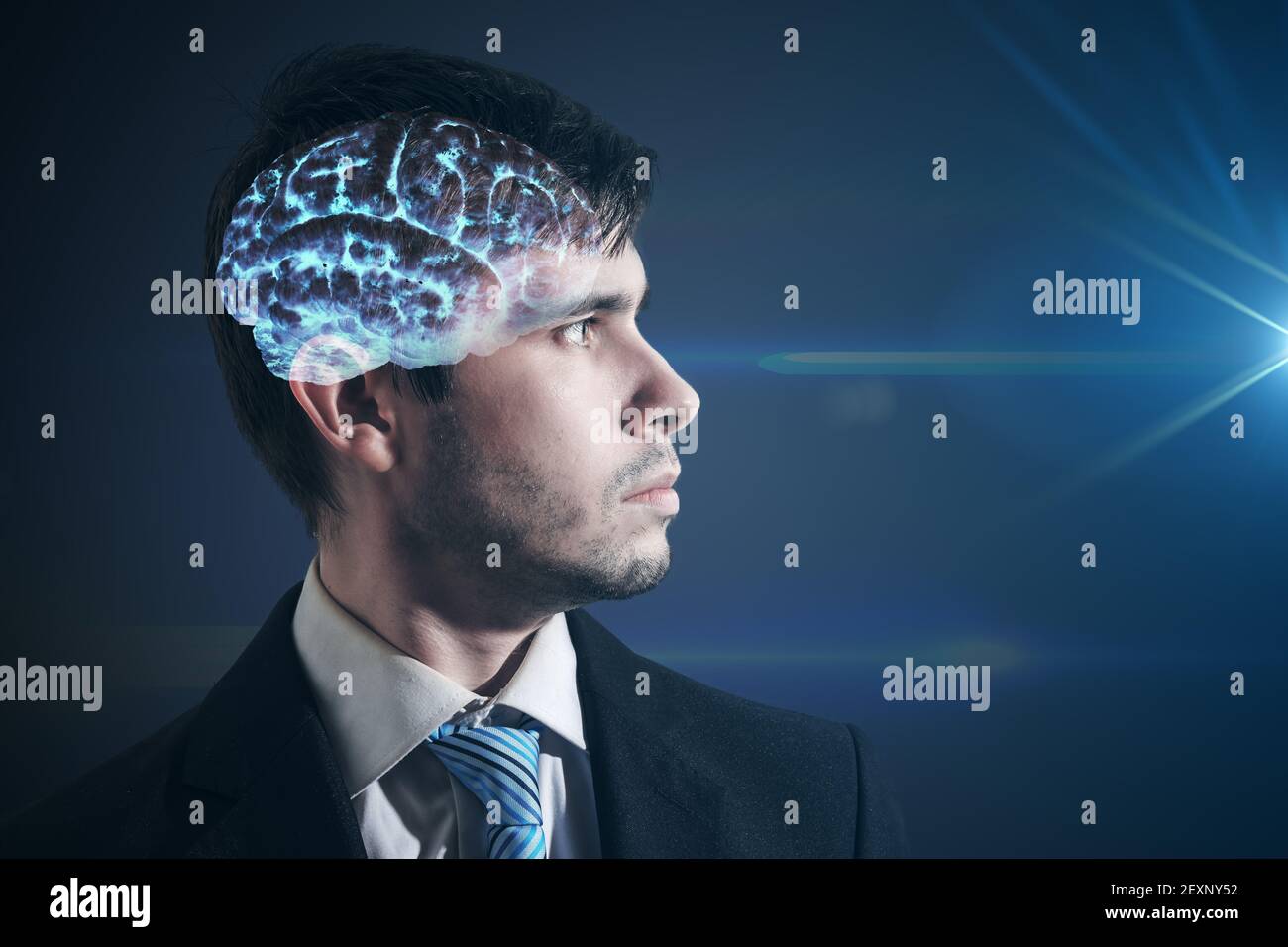 Glowing brain inside man's head. Businessman is looking in light Stock ...