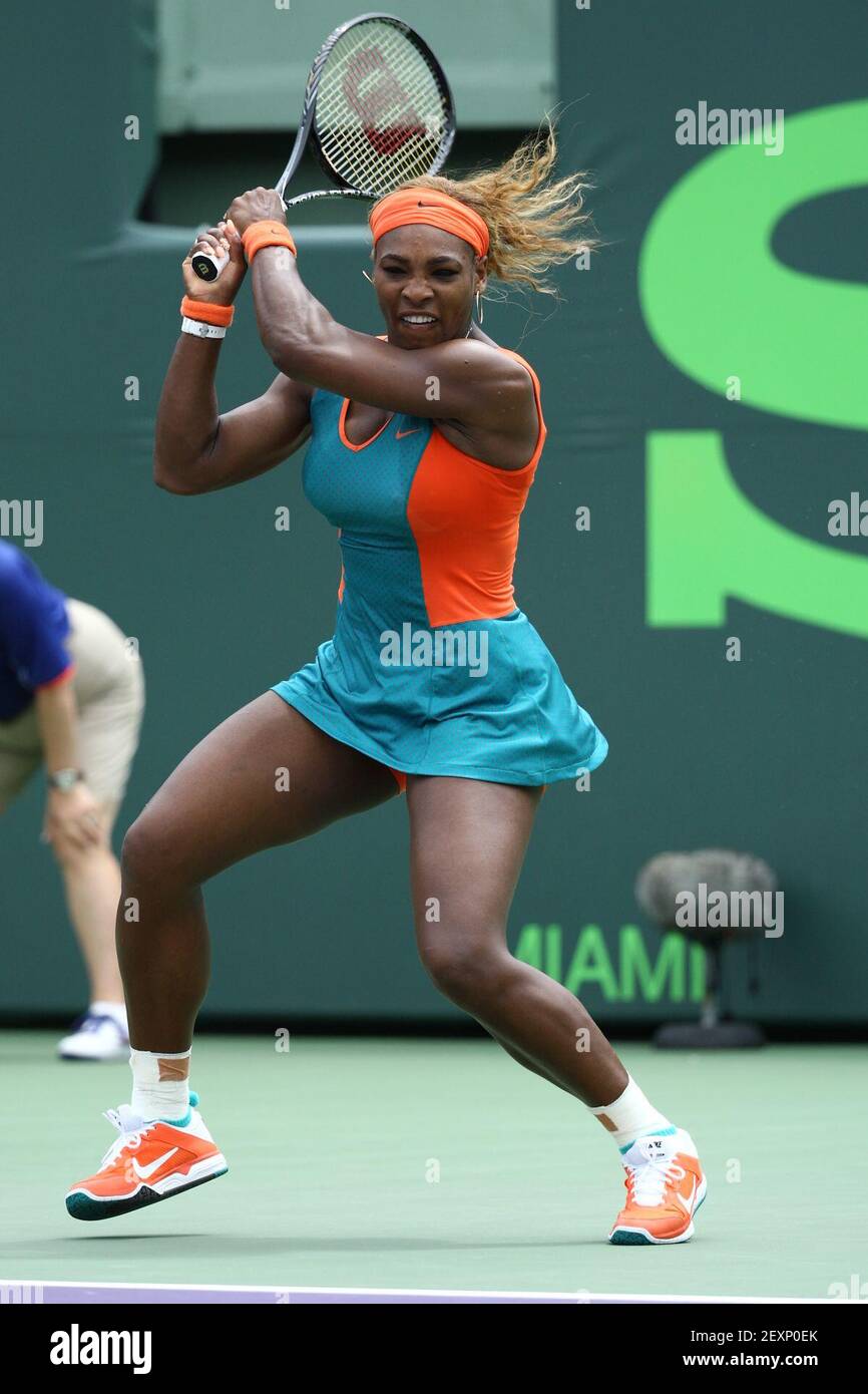 Serena Williams of the United States serves against Li Na of China ...