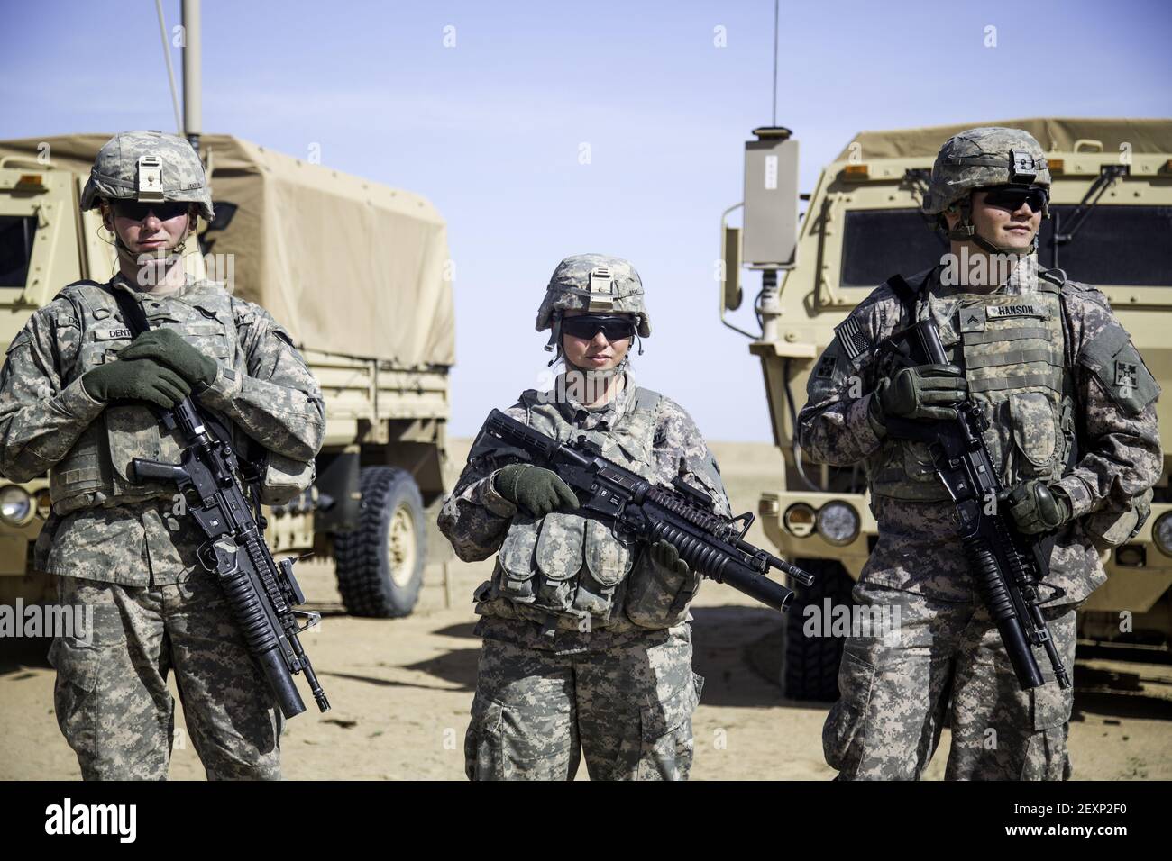 U.S. Army Spc. Nina Bray, center, an intelligence analyst with ...