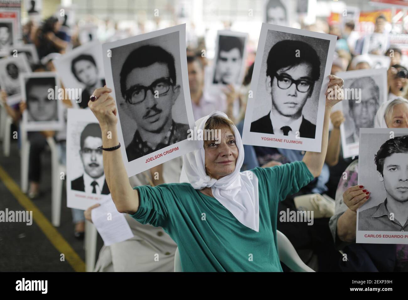People on the streets of Sao Paulo, on March 31, 2014, on the ...