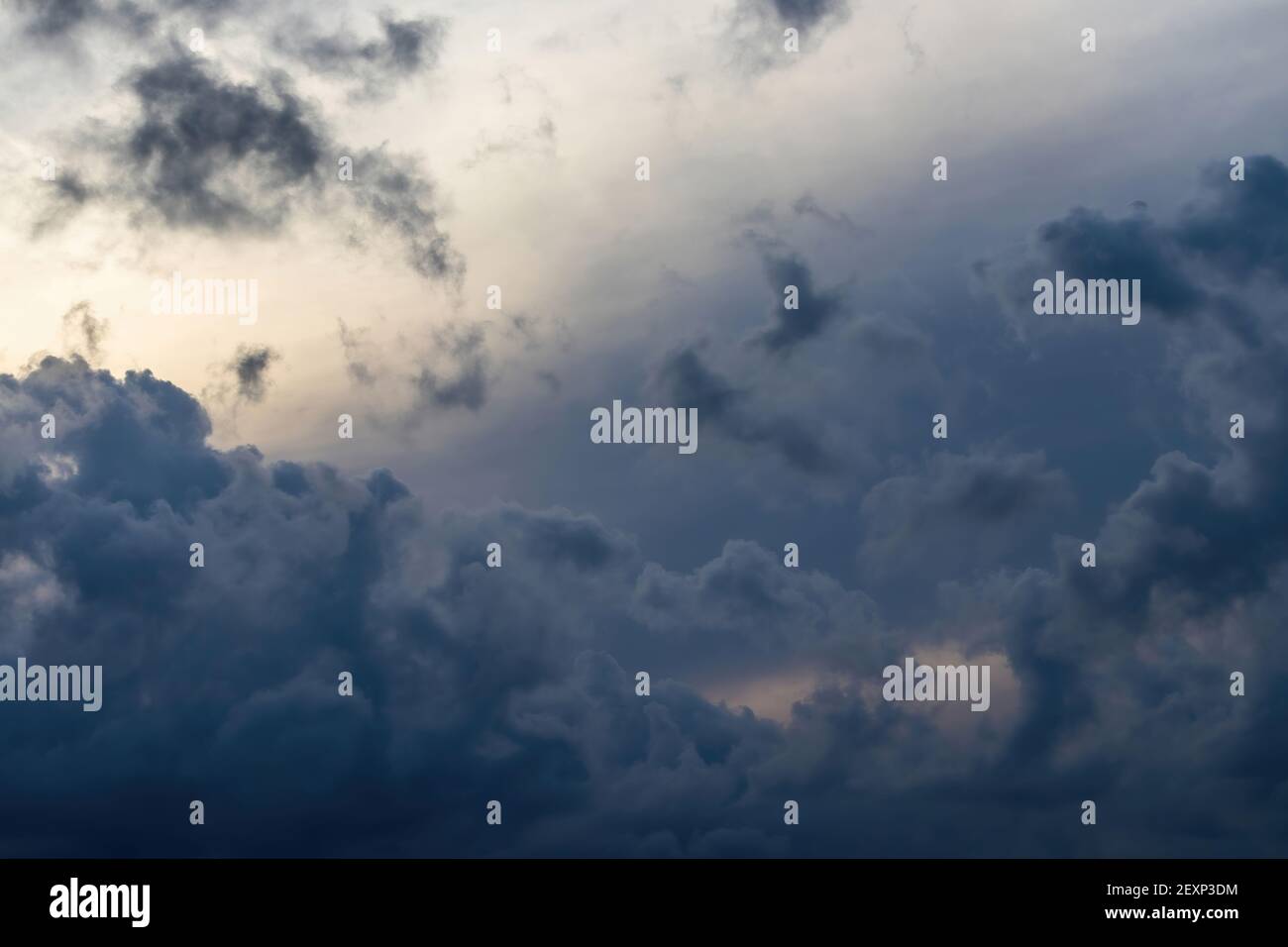 A dramatic build-up of rain clouds, that rapidly smother rays of ...