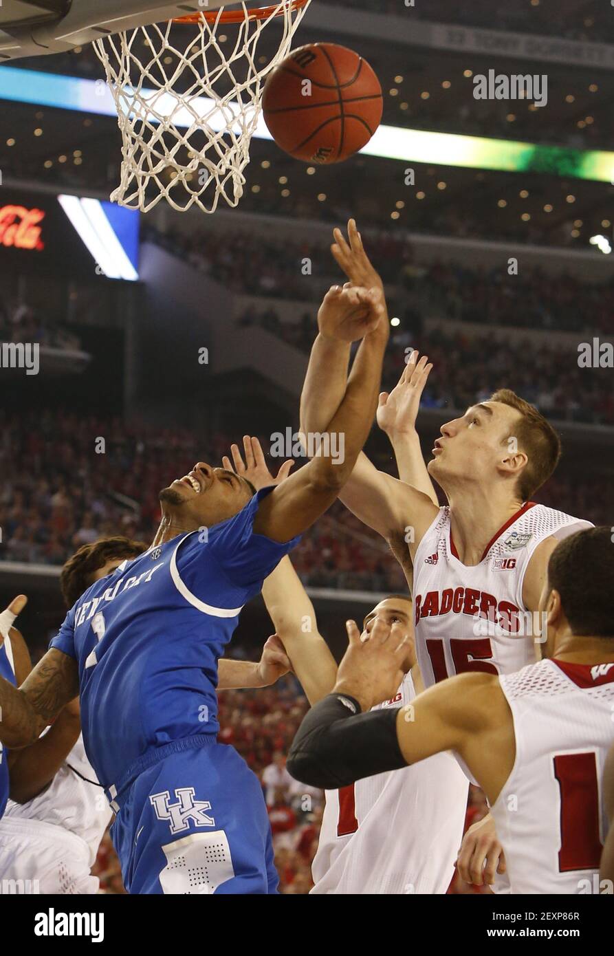 Kentucky Wildcats guard/forward James Young (1) puts up a shot defended ...