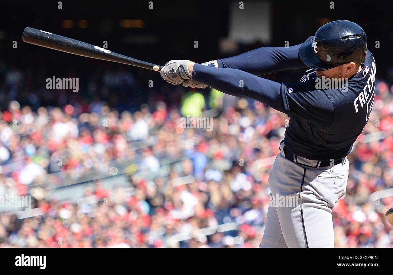 Atlanta Braves first baseman Freddie Freeman (5) strokes a single in ...