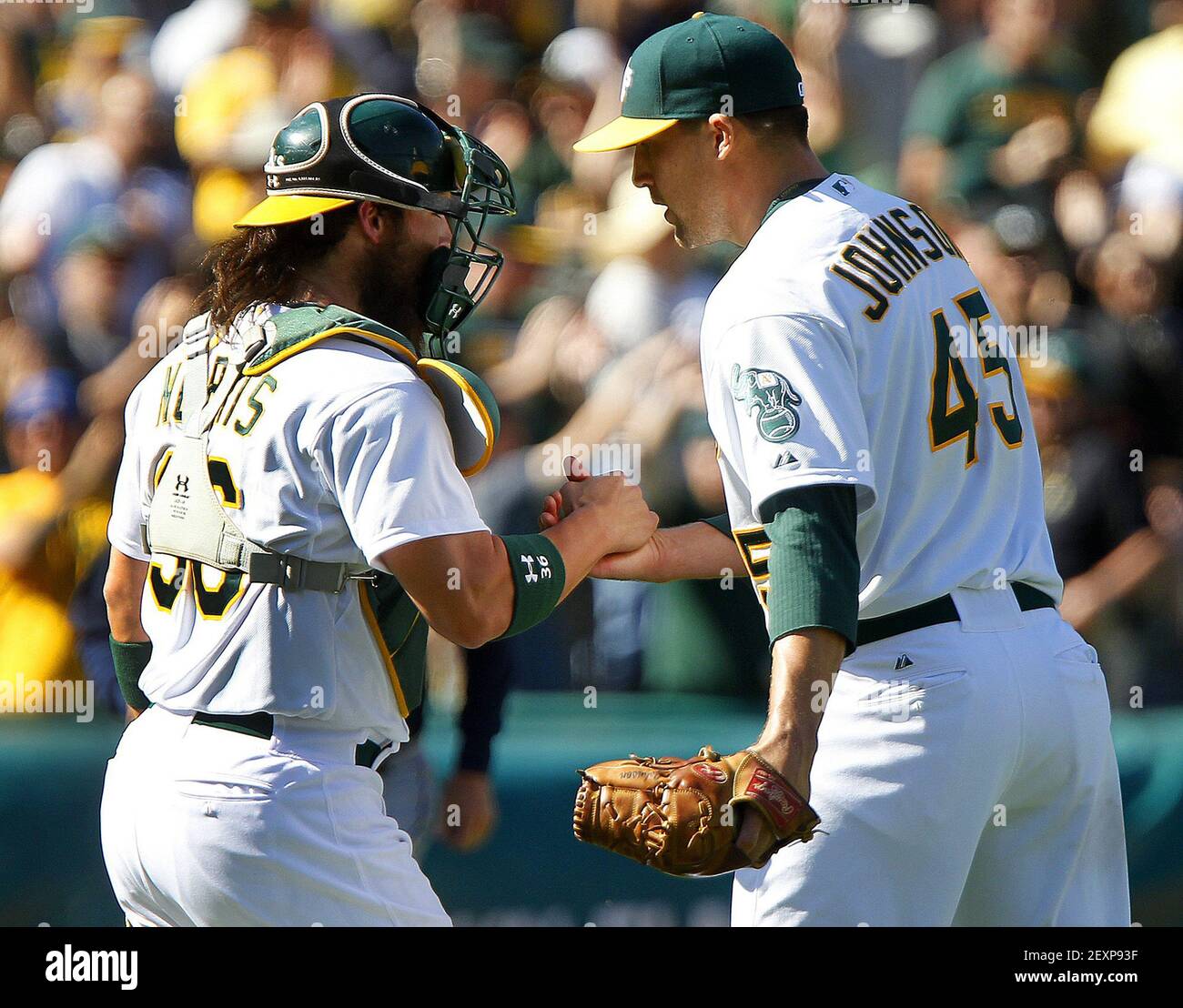 Oakland Athletics catcher Derek Norris (36) celebrates with pitcher Jim ...