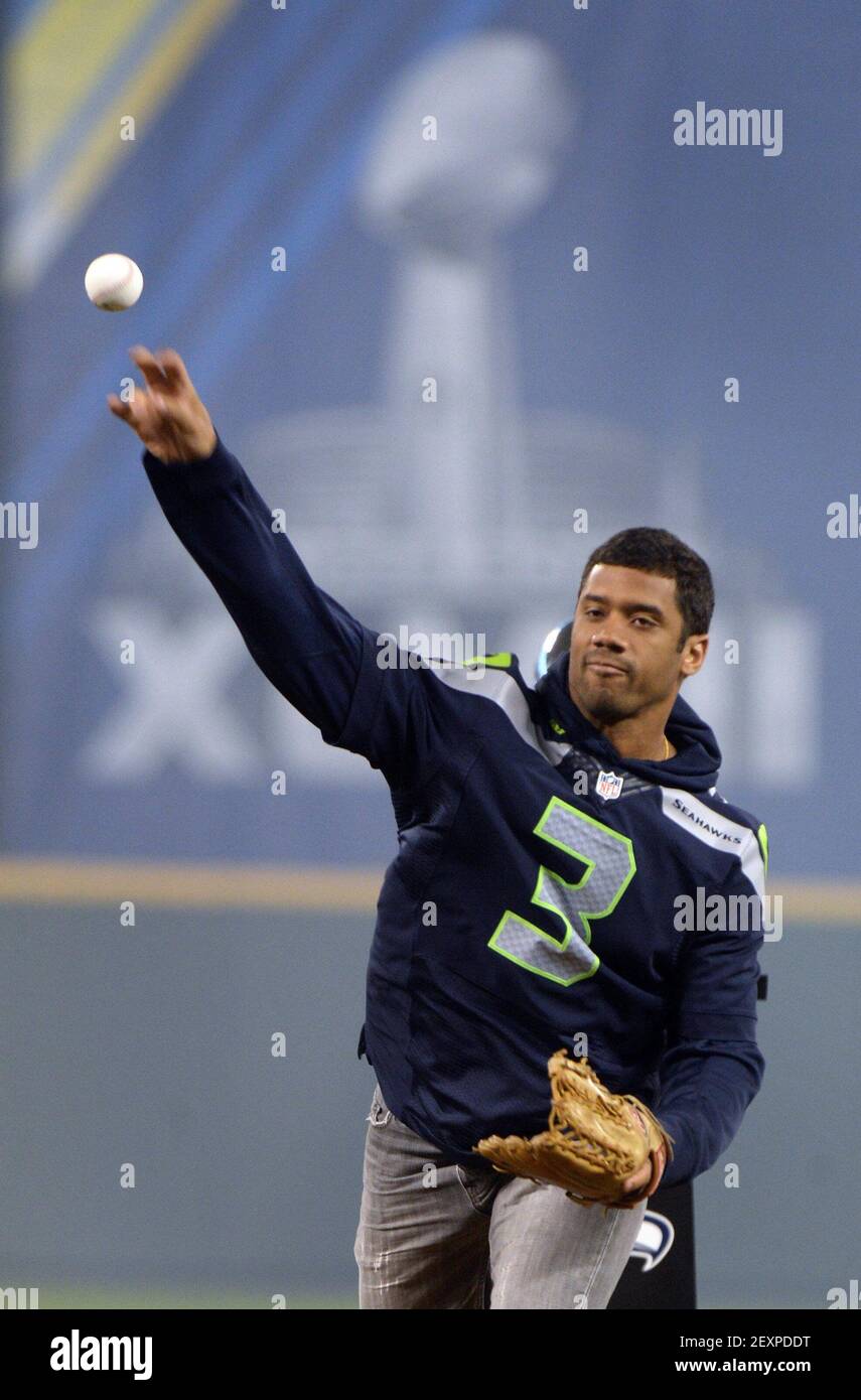 Seattle Seahawks quarterback Russell Wilson throws the ceremonial first ...