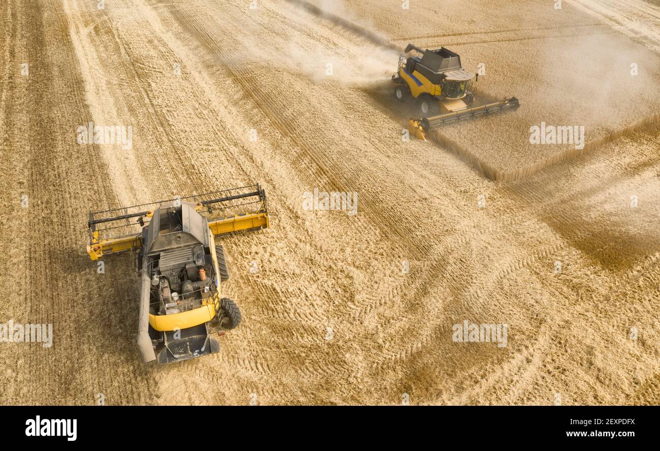 Agricultural machinery harvesting wheat two hi-res stock photography ...